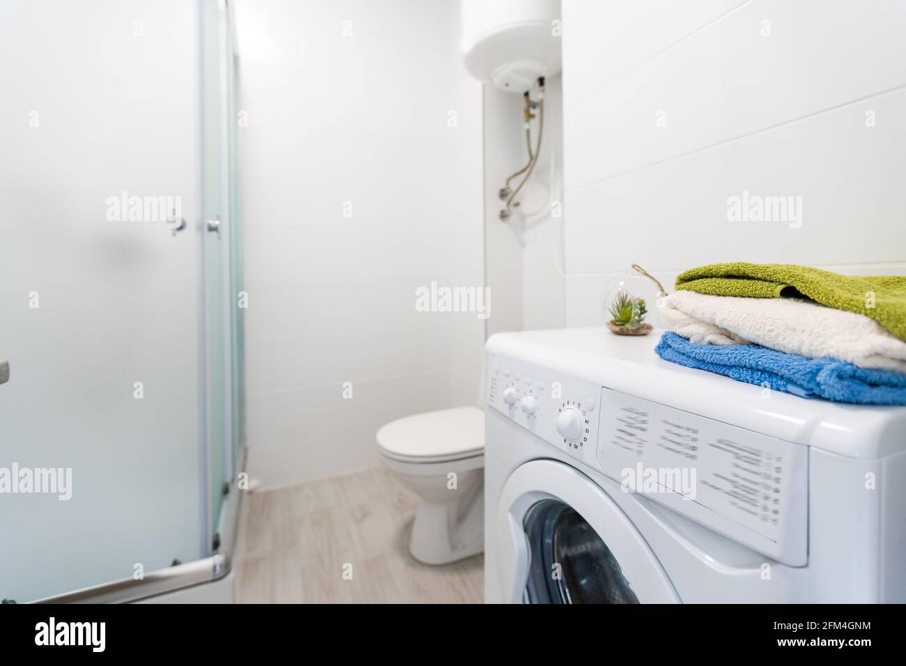 Modern white washing machine front panel with display Stock Photo - Alamy
