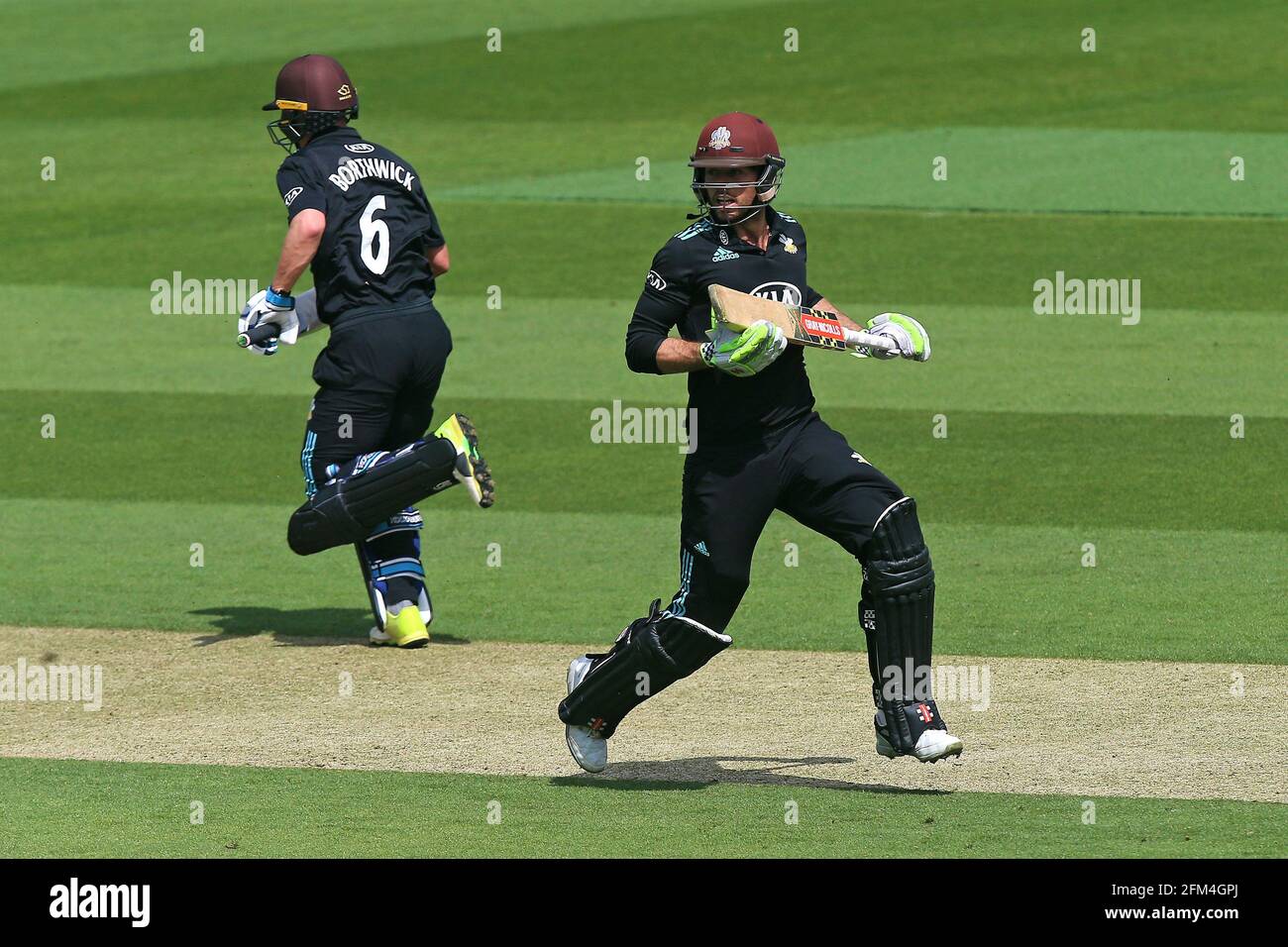 Ben Foakes (R) and Scott Borthwick add to the Surrey total during ...