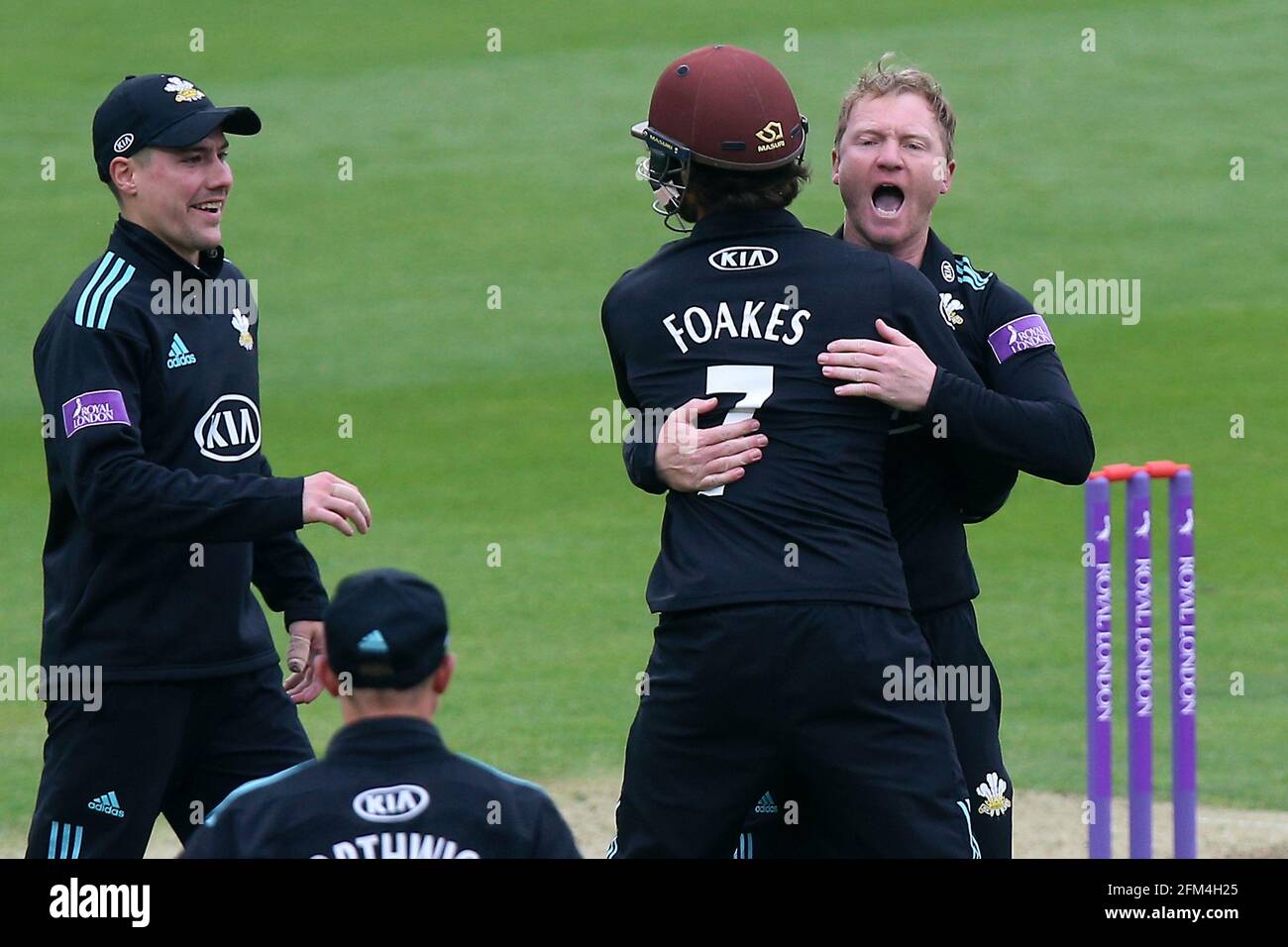 Gareth Batty of Surrey celebrates taking the wicket of Ashar Zaidi ...