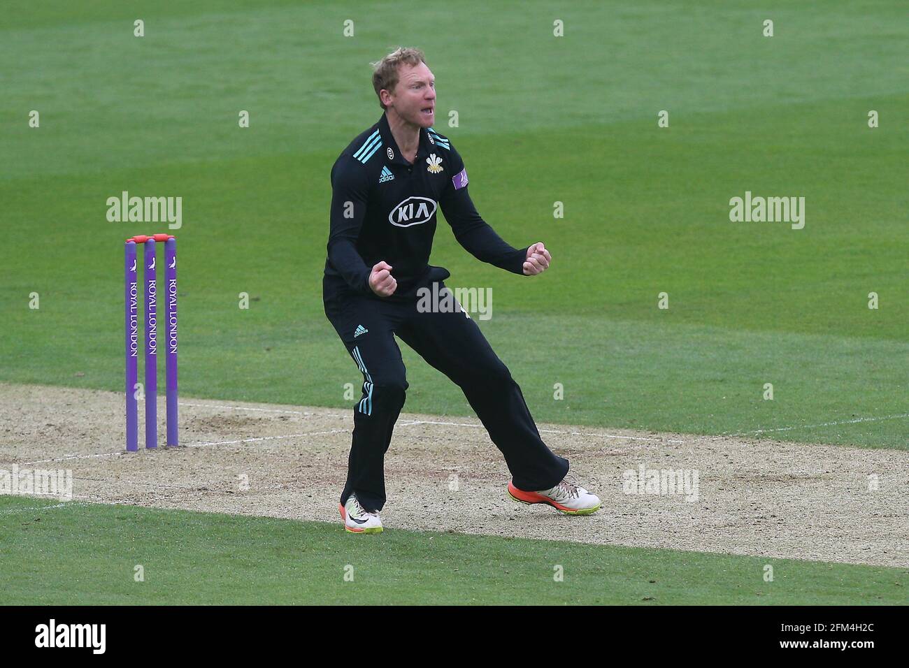 Gareth Batty of Surrey celebrates taking the wicket of Ashar Zaidi ...