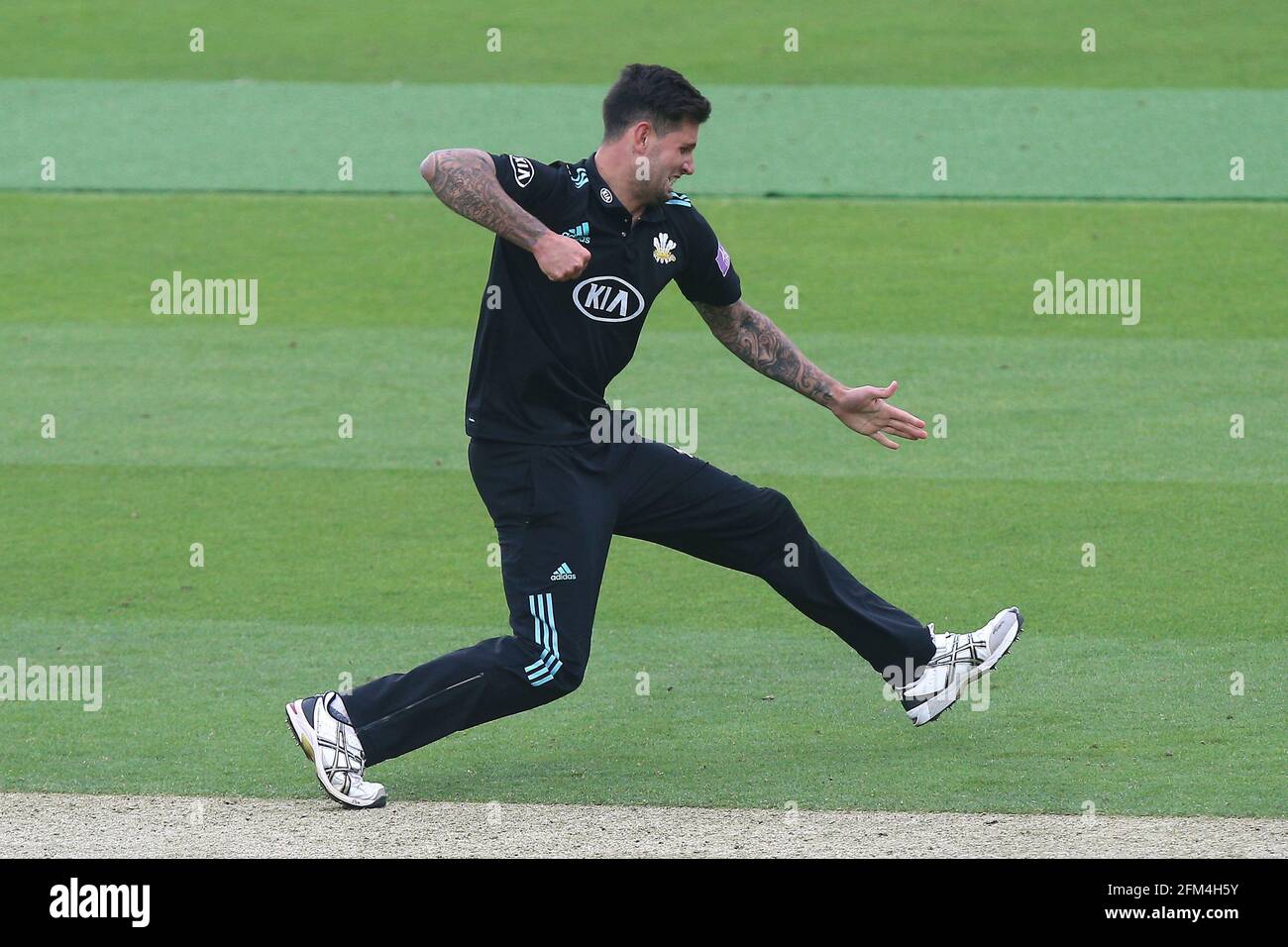 Jade Dernbach of Surrey celebrates taking the wicket of Neil Wagner ...