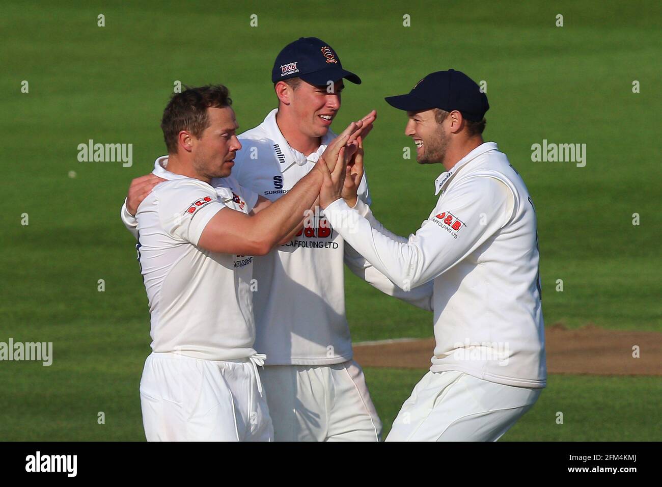 Graham Napier of Essex (L) celebrates taking the wicket of Chris Nash ...