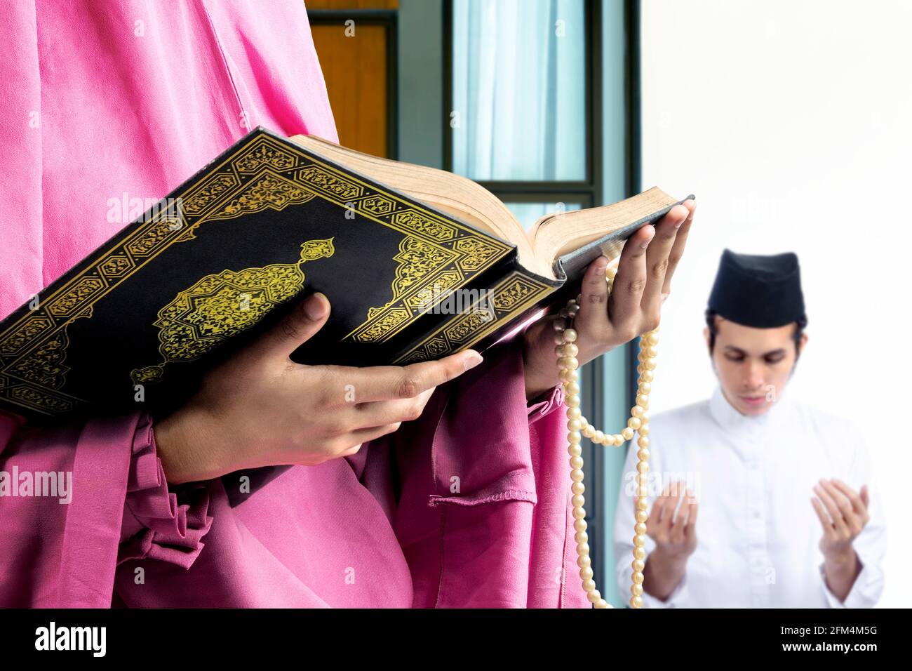 Muslim Couple Praying Together