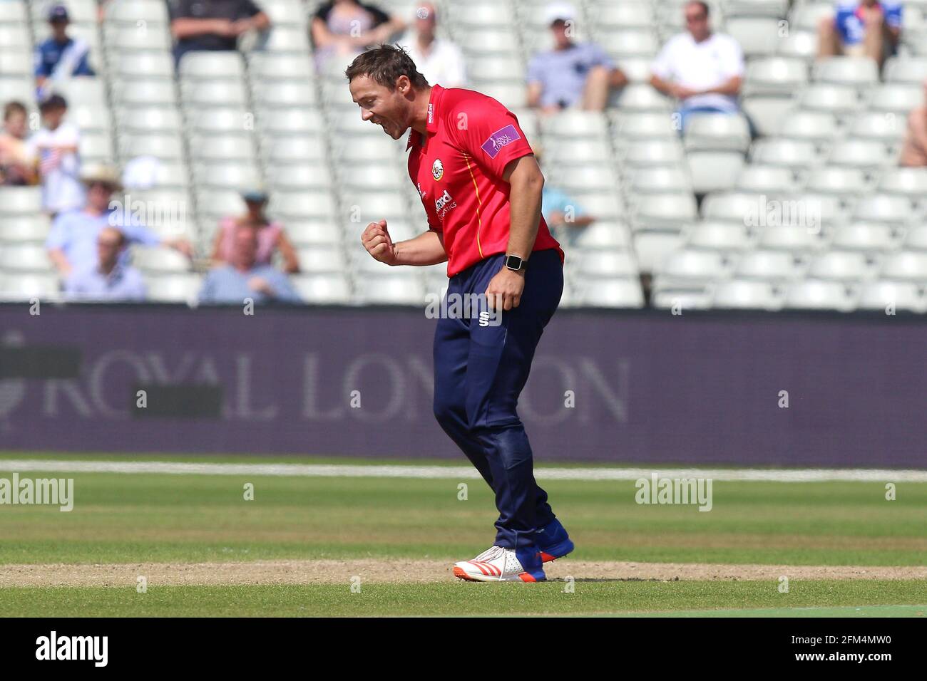 Graham Napier of Essex celebrates taking the wicket of Rikki Clarke ...