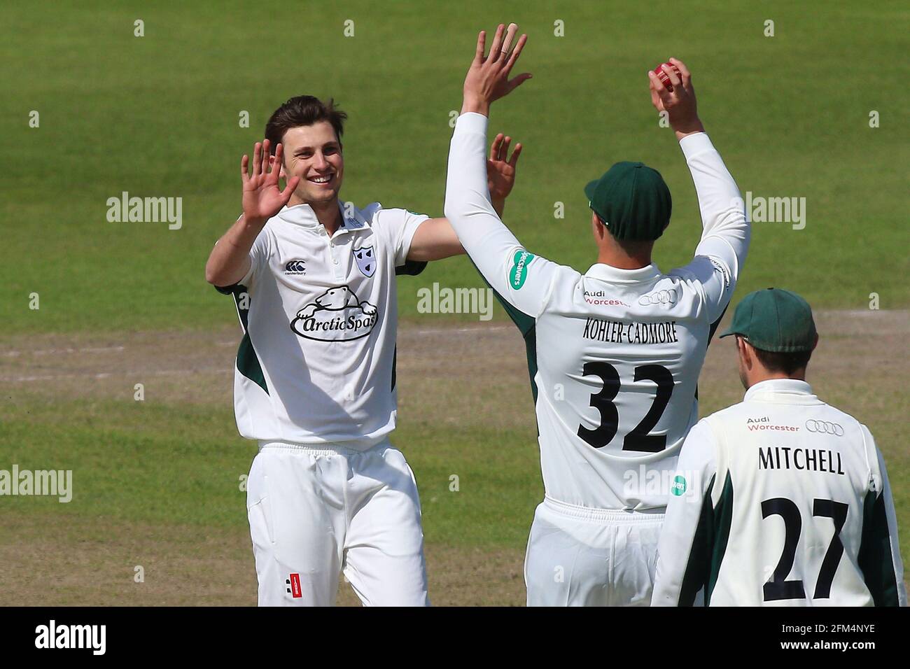 Ed Barnard of Worcestershire (L) celebrates taking the wicket of Nick ...