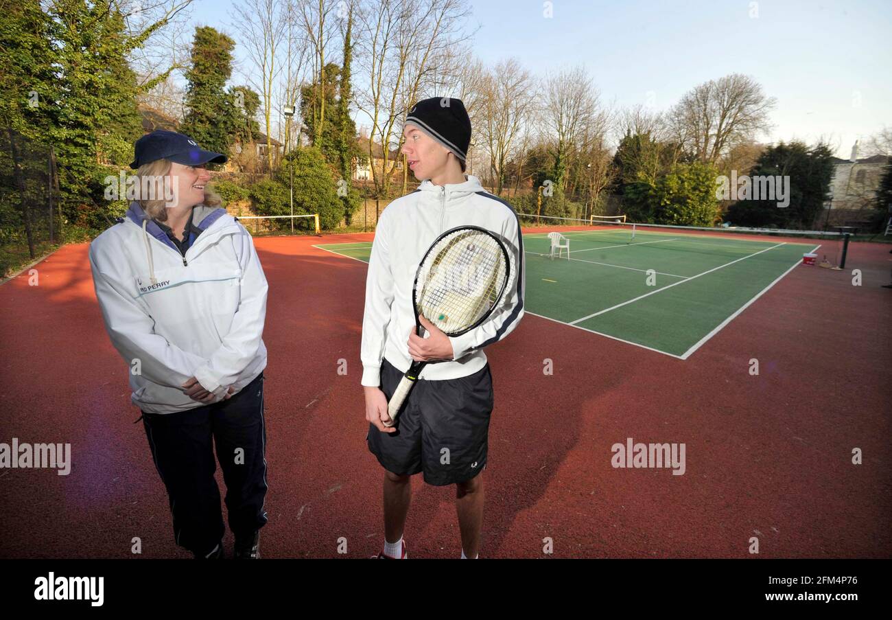 Sandra golding and son Oliver on their tennis court at the back of ...
