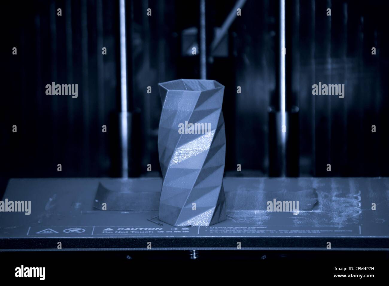 Objects printed by 3d printer. Automatic three dimensional 3d printer ...