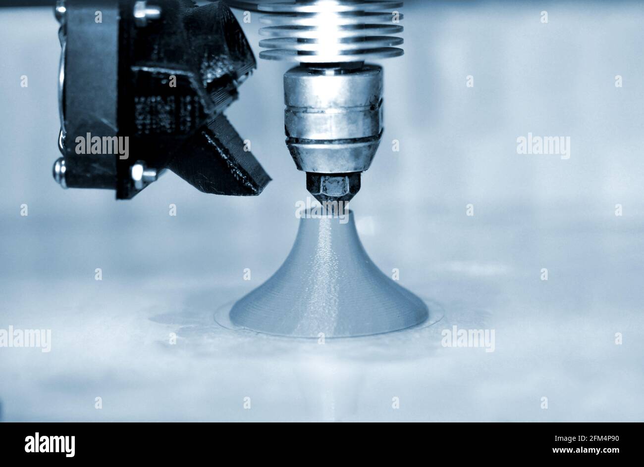 Modern 3D printer printing figure blue colors close-up Stock Photo - Alamy