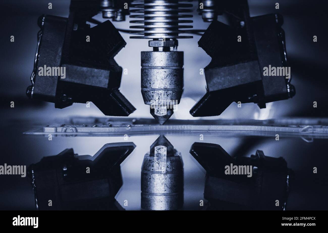 3D printer print isolated objects on mirror reflective surface close-up ...