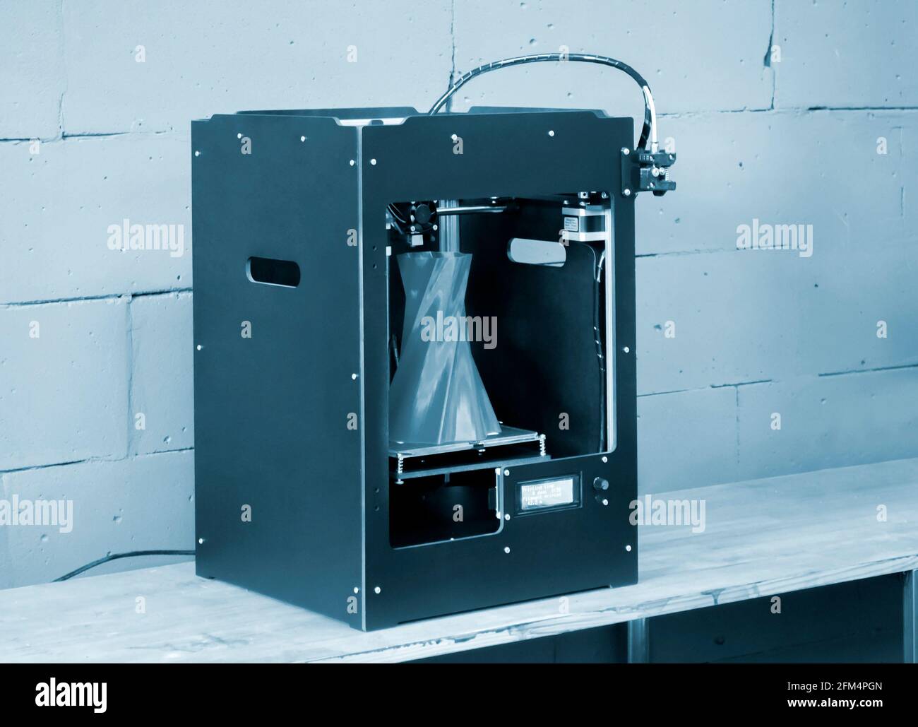 3D printer working close up. Automatic three dimensional 3d printer ...