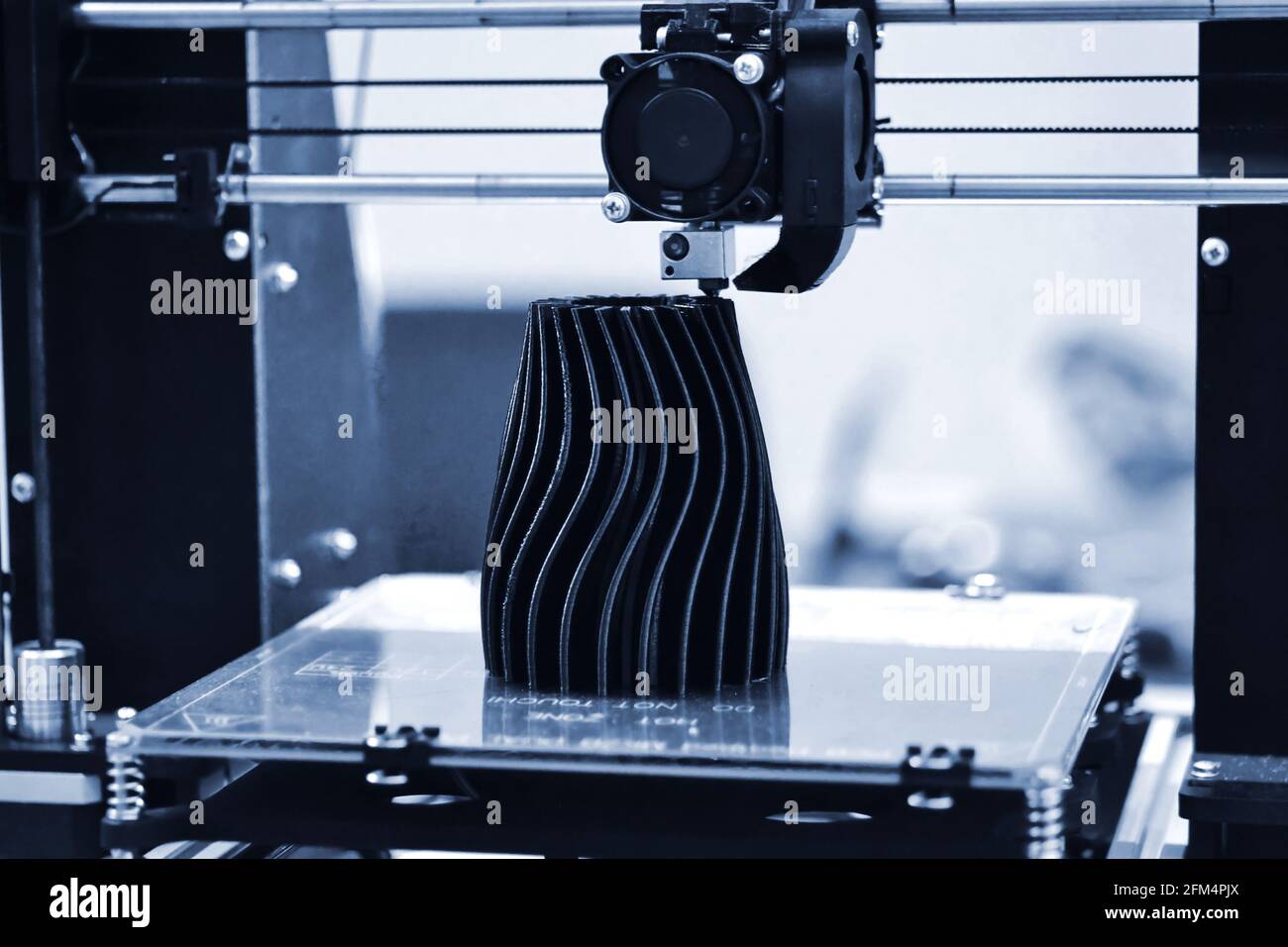 The process of working 3D printer and creating a three-dimensional ...