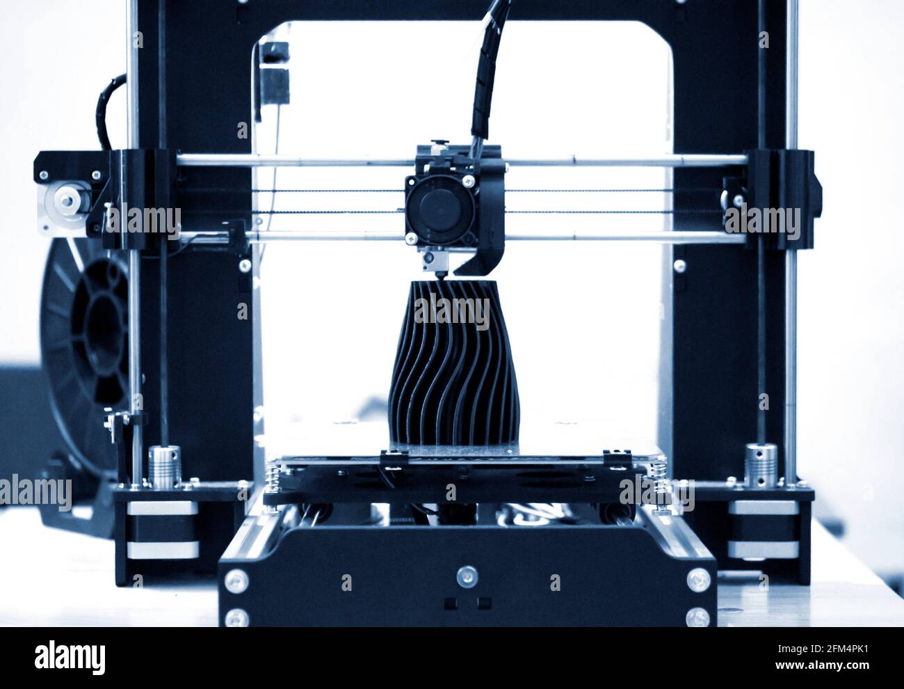 The process of working 3D printer and creating a three-dimensional object Stock Photo - Alamy