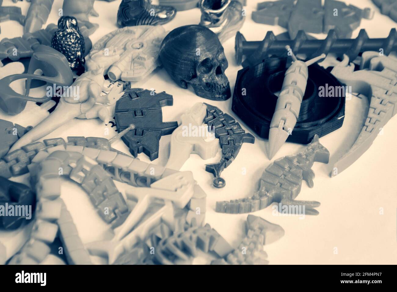 Models printed by 3d printer. Bright colorful objects printed on a 3d ...