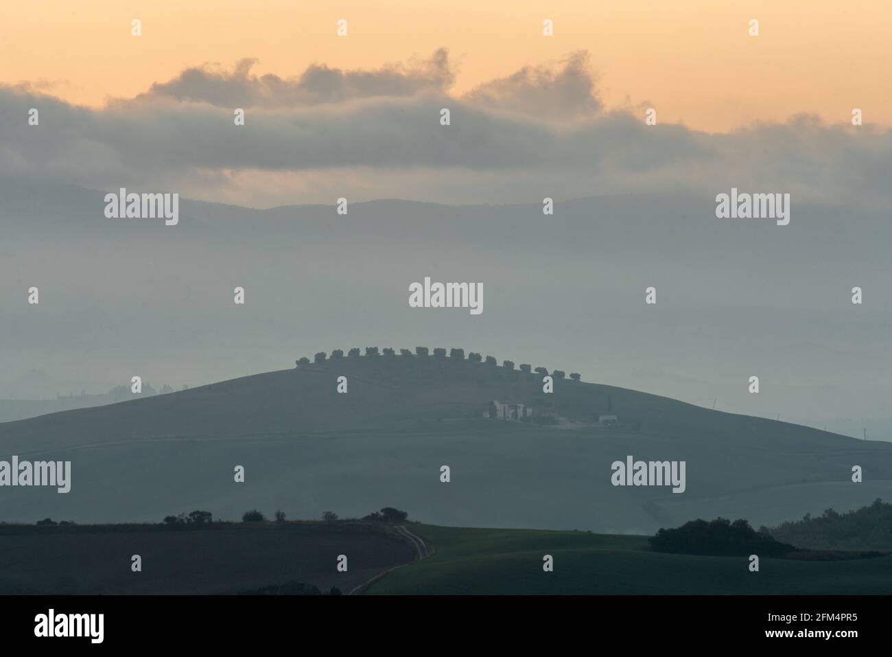 The Tuscan countryside, an Italian landscape on an early autumn morning ...