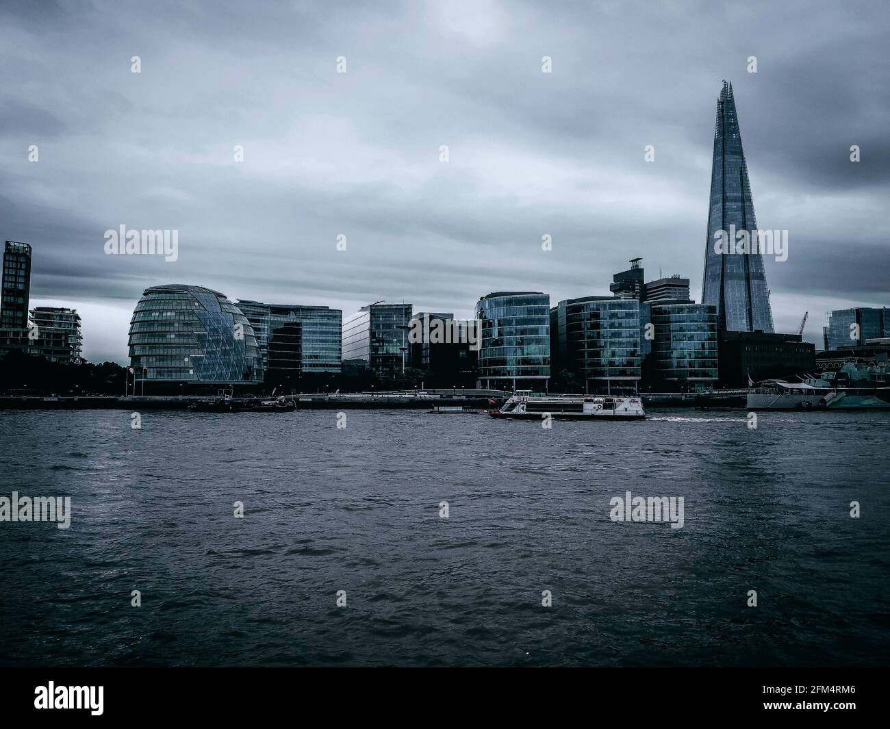 Eerie scenery of cityscape by the sea Stock Photo - Alamy