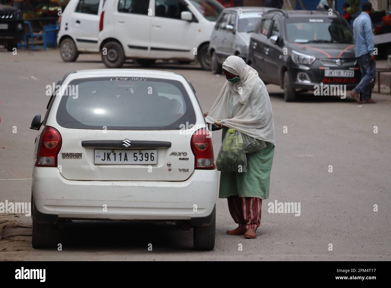 May 6, 2021, Poonch, Jammu and Kashmir, India: A destitute woman begs ...
