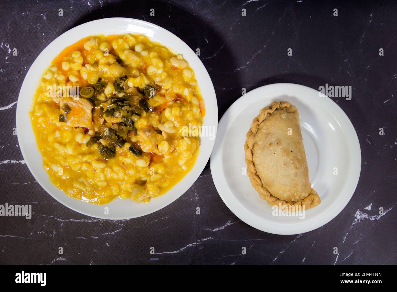 Empanadas and locro, typical foods of Argentine gastronomy Stock Photo ...