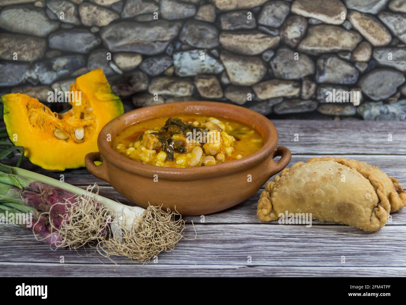Empanadas and locro, typical foods of Argentine gastronomy Stock Photo ...