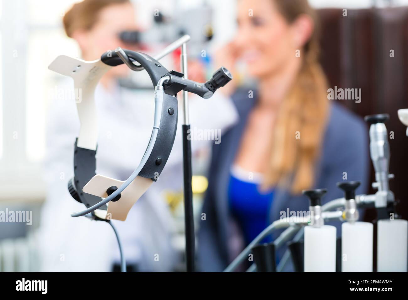 Ent specialist doctor examining patient hi-res stock photography and ...