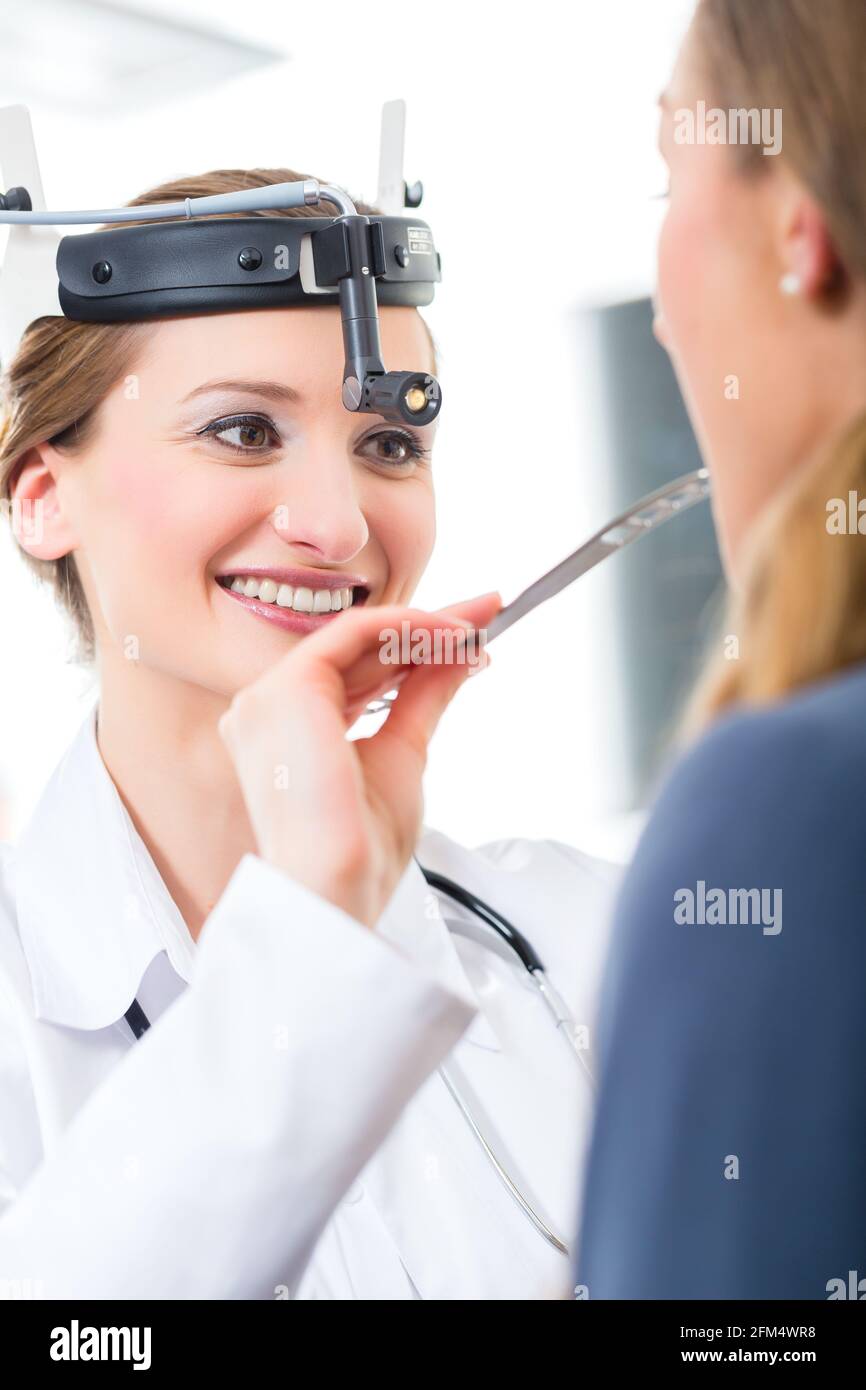 Nose and throat examination ent examination hi-res stock photography ...