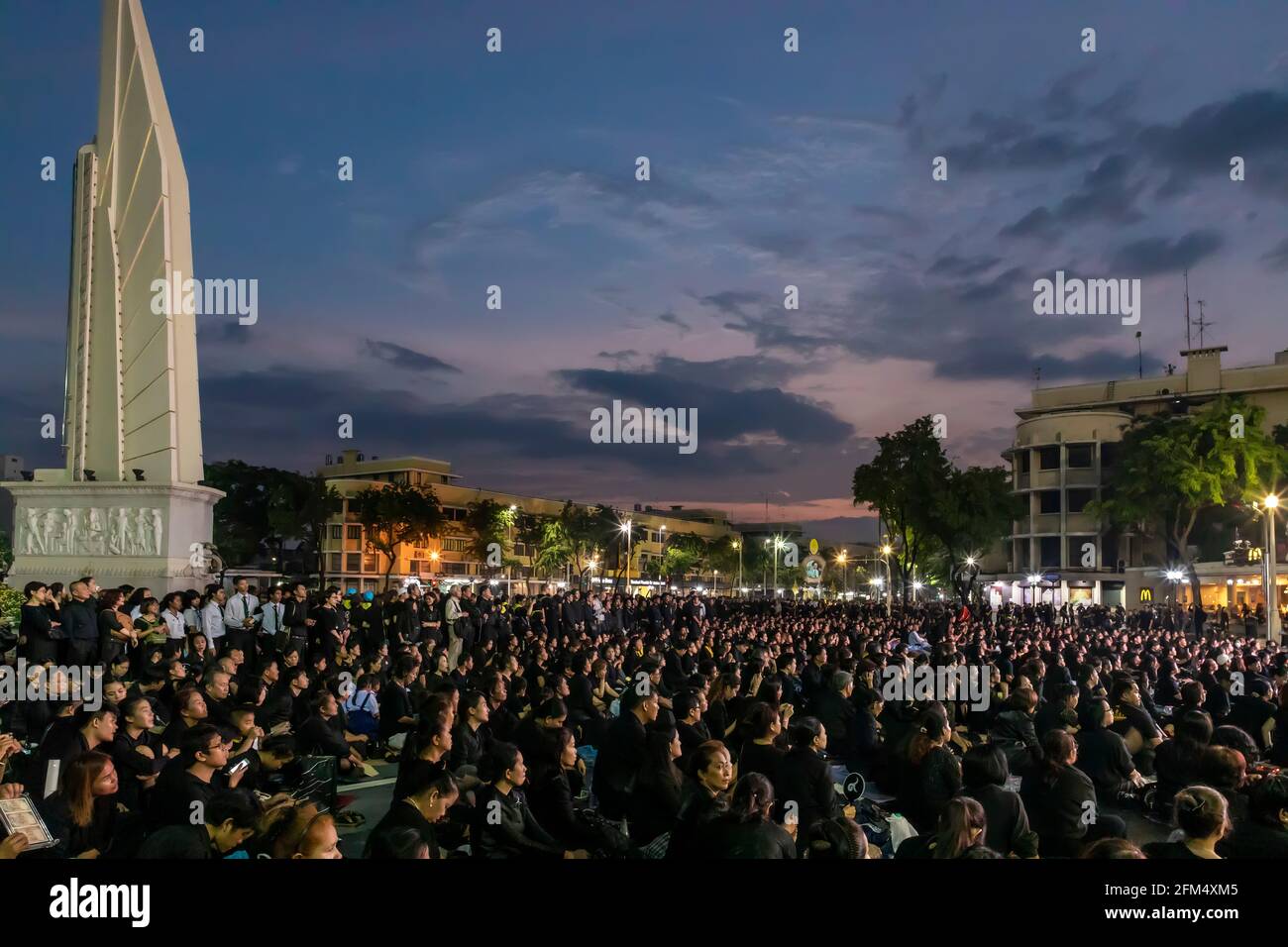 Mourners at Democracy Monument for funeral of King Rama IX at night ...