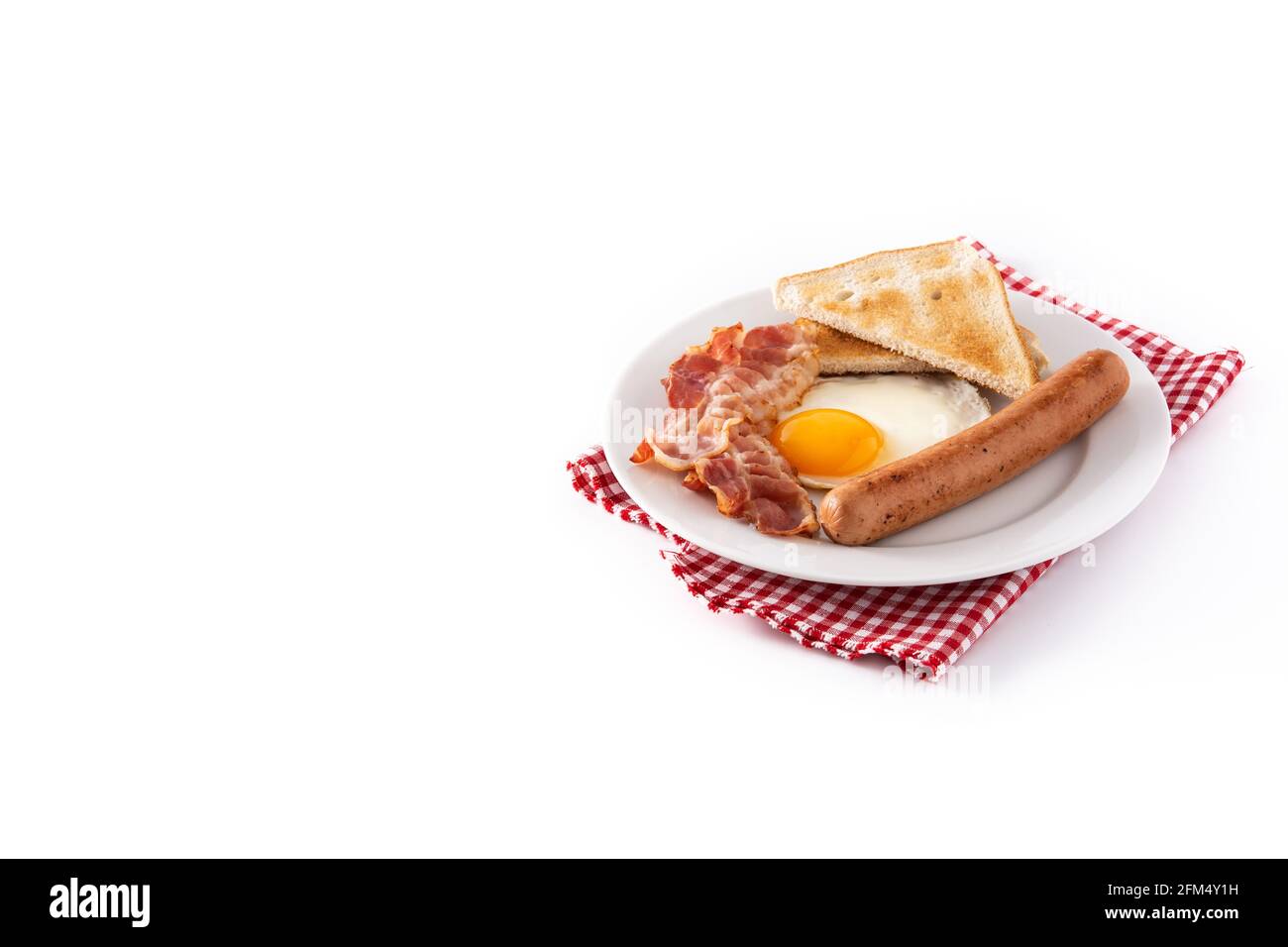 Traditional American breakfast with fried egg,toast,bacon and sausage ...