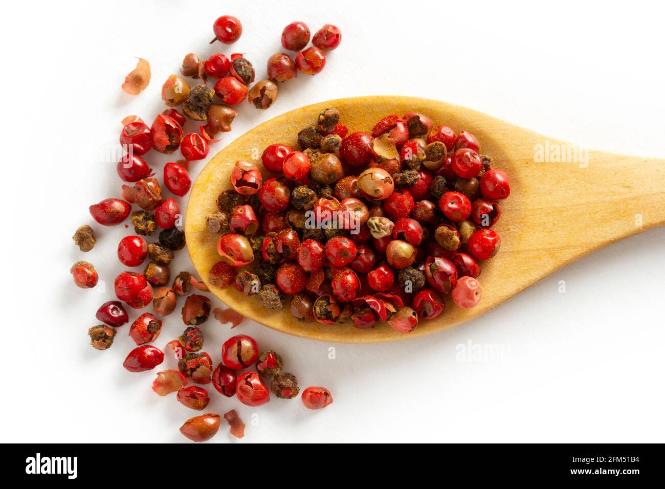 Red hot pepper and black pepper seeds Stock Photo - Alamy