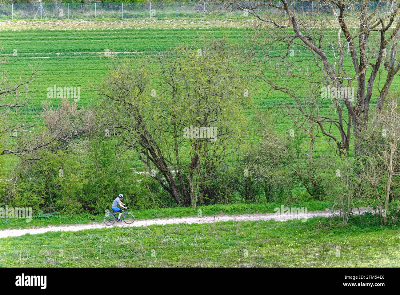 Male cyclist with bike hi-res stock photography and images - Alamy