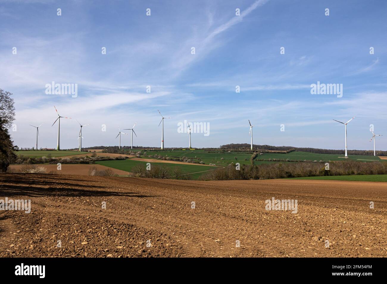 Spring landscape with arable land and meadows Stock Photo - Alamy