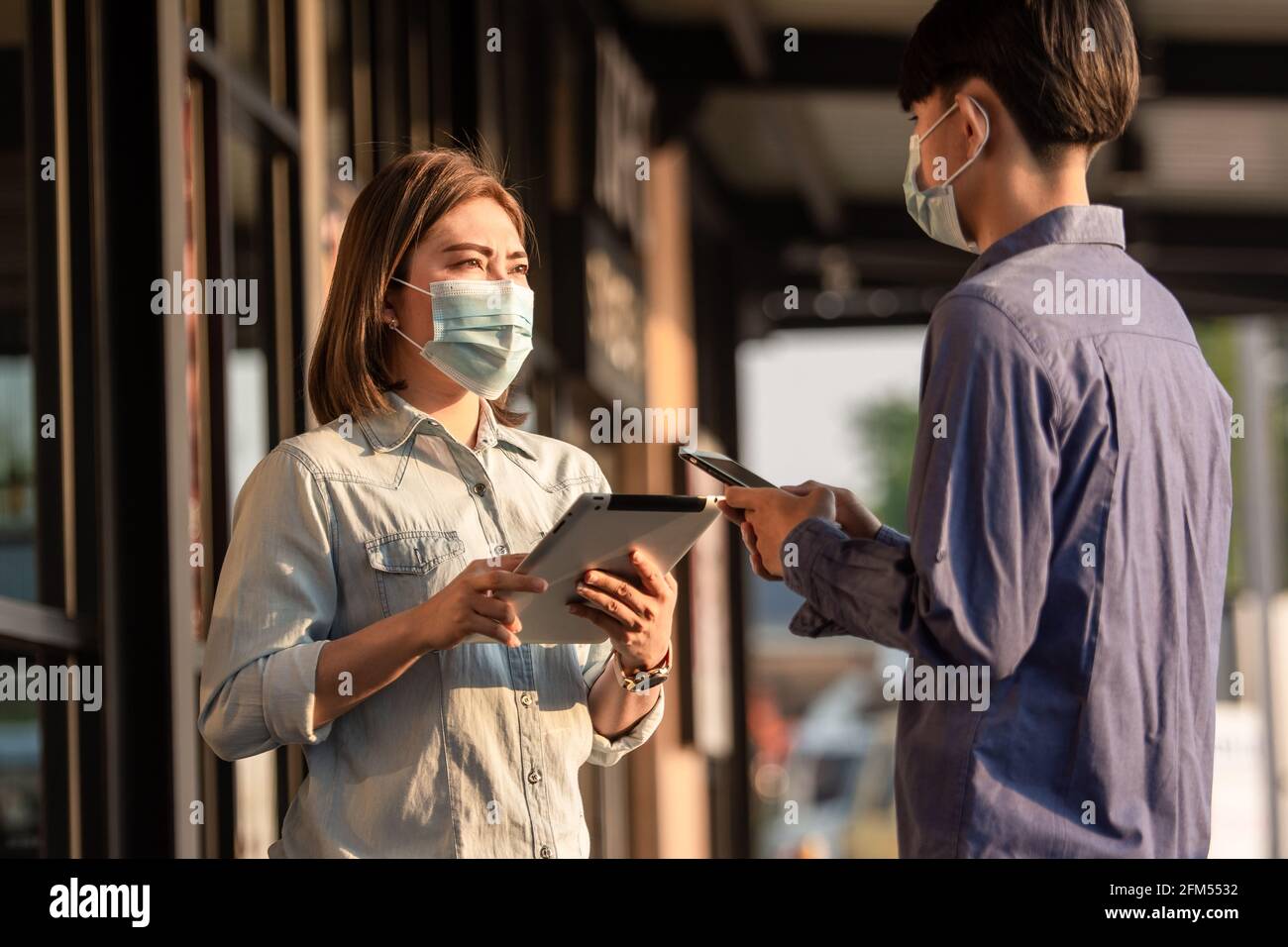 People wear face mask talking protect covid19 coronavirus Stock Photo ...