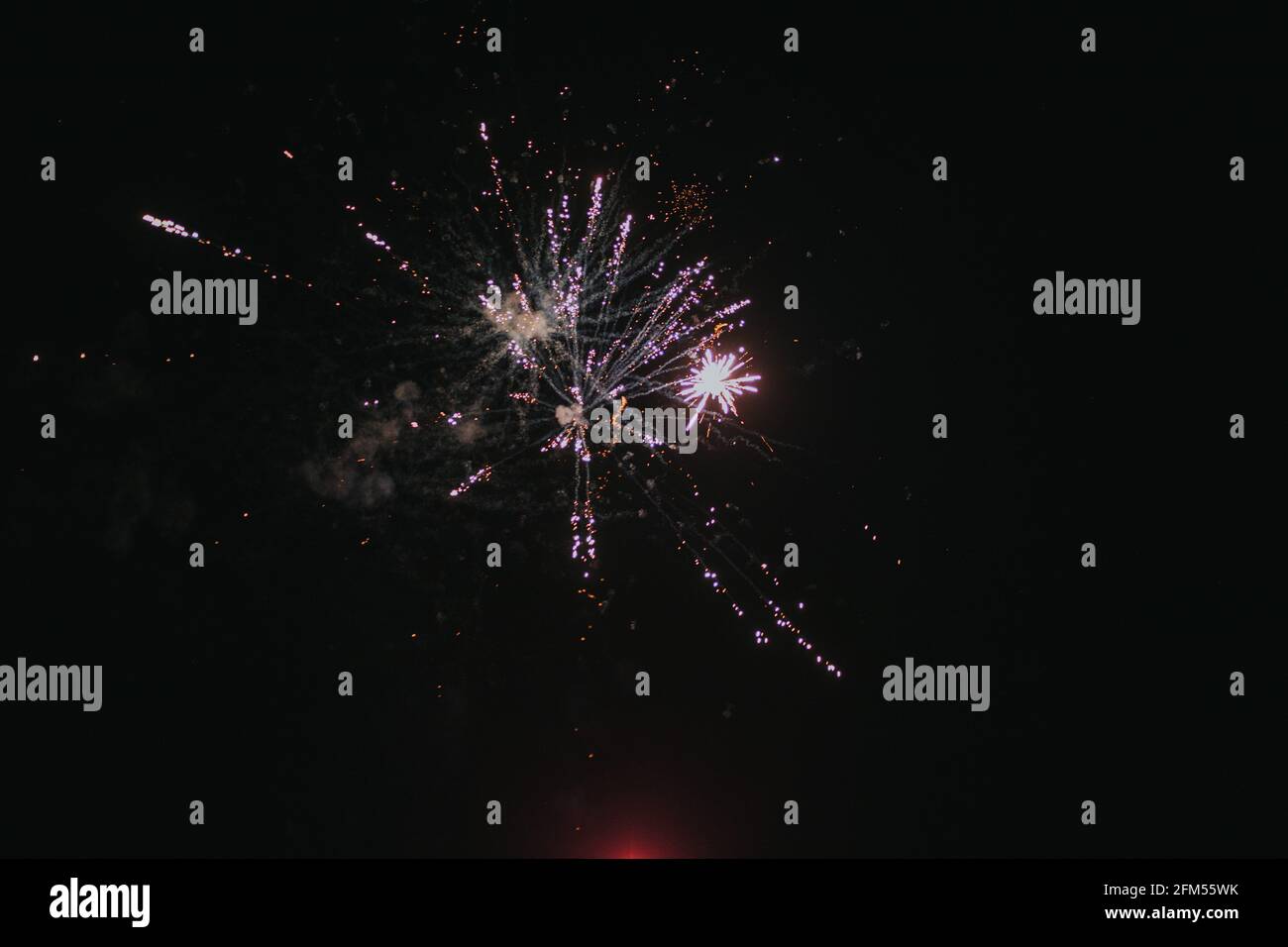 Beautiful fireworks in the night sky Stock Photo - Alamy