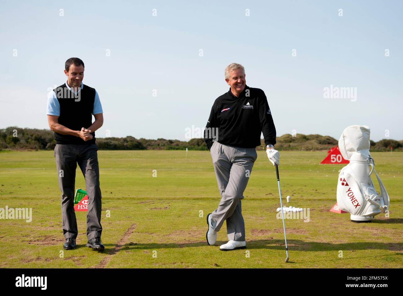 Golfer Colin Montgomery with Golf Commentator Andrew Cotter Stock Photo ...