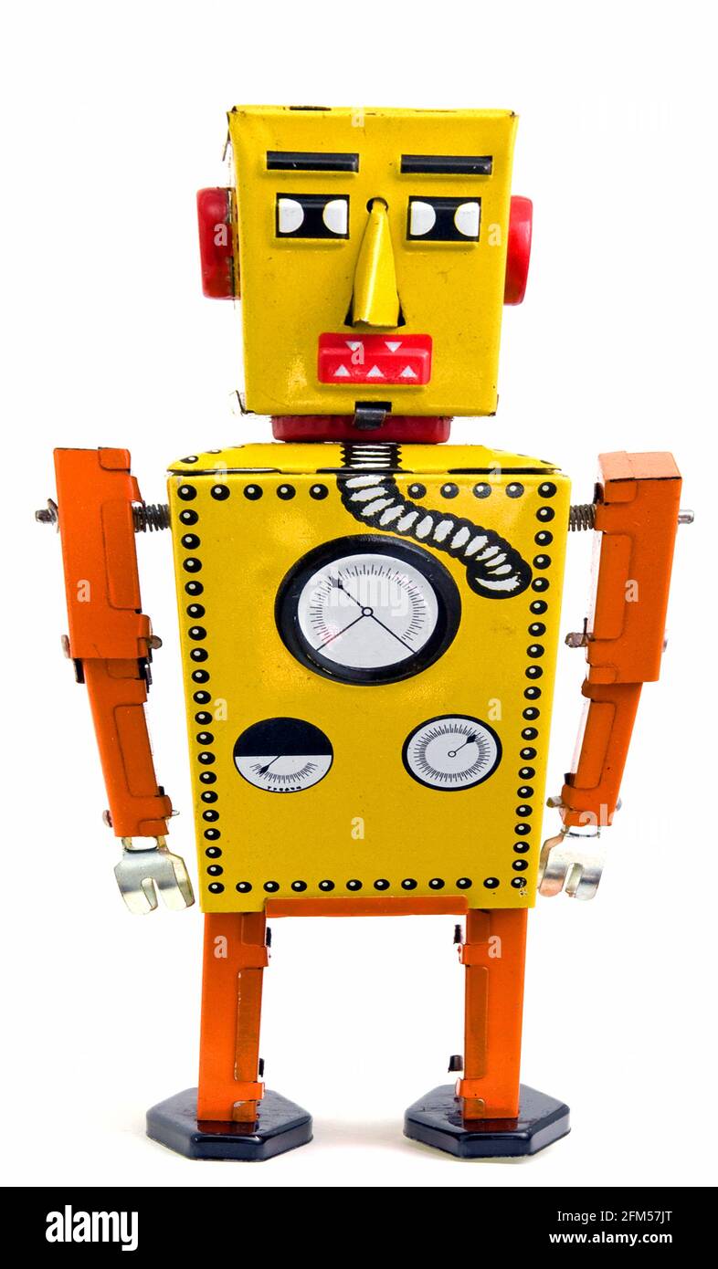 retro funny yellow robot toy isolated on white Stock Photo - Alamy