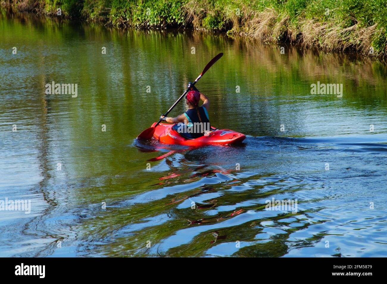 FRANKFURT, GERMANY - Apr 23, 2021: A paddler on the Nidda in Frankfurt ...