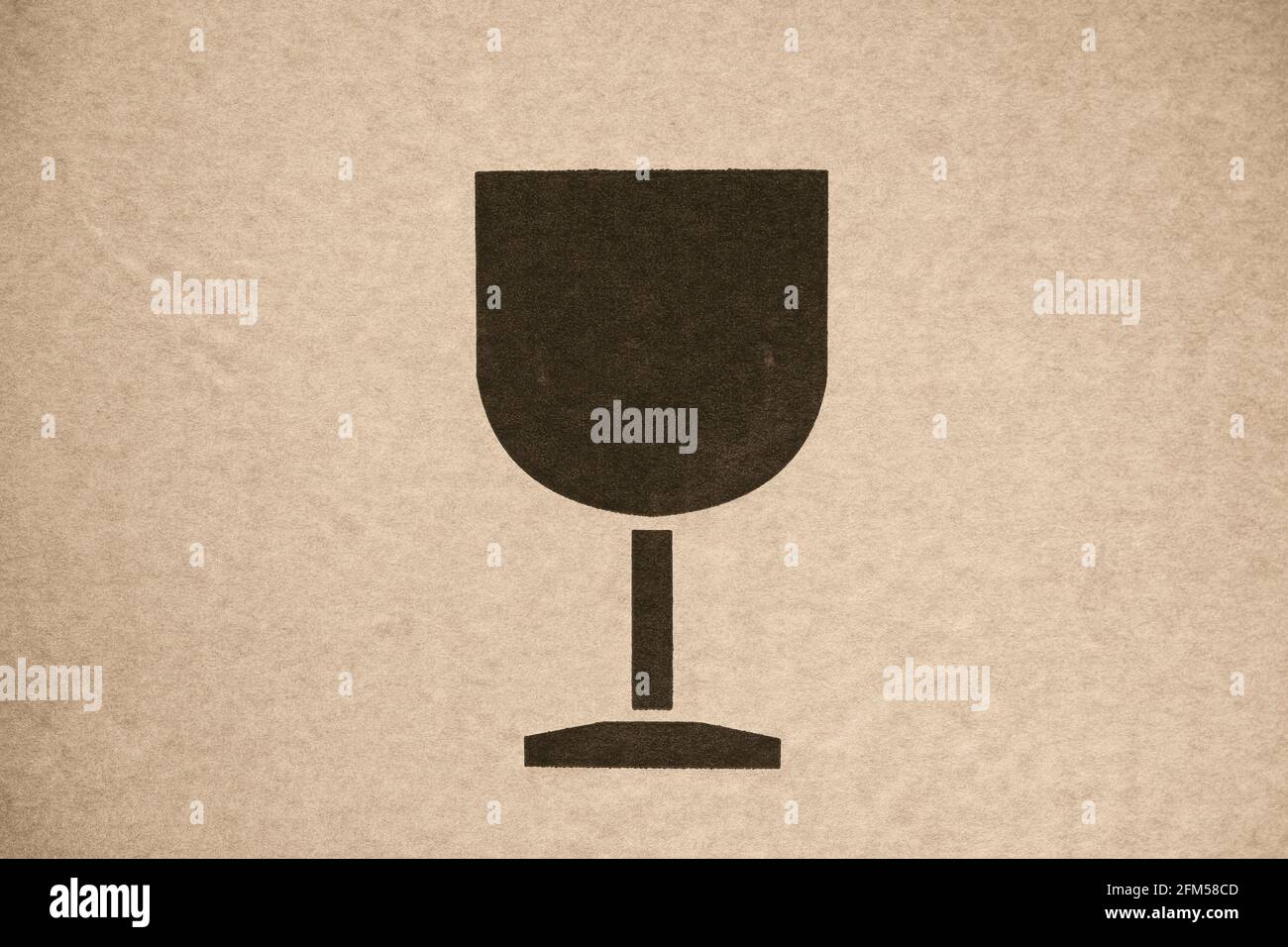 Fragile symbol (Wine Glass) on cardboard. Close up Stock Photo - Alamy