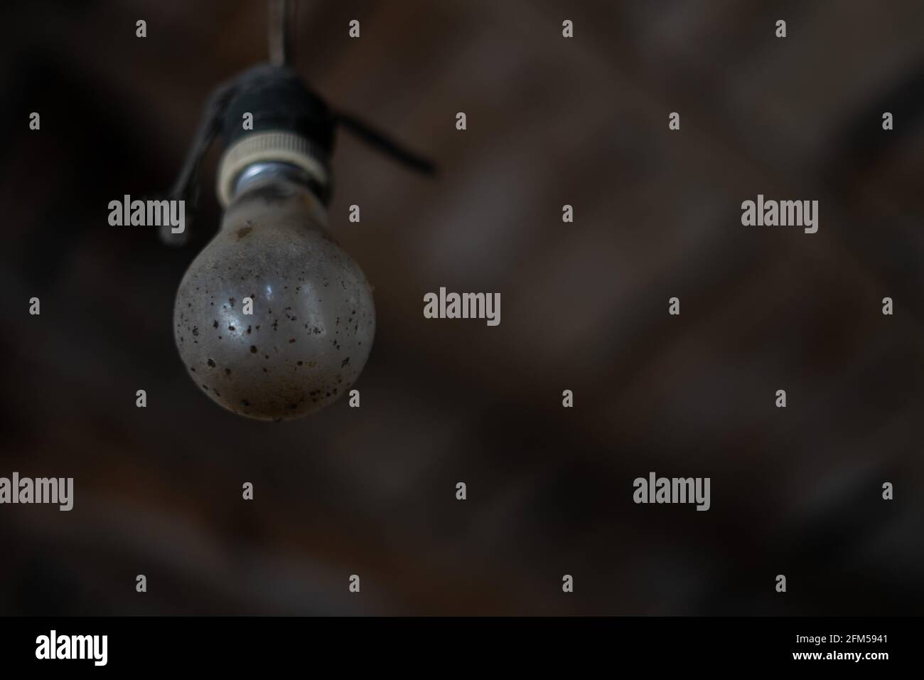 old light bulb in rural town Stock Photo - Alamy