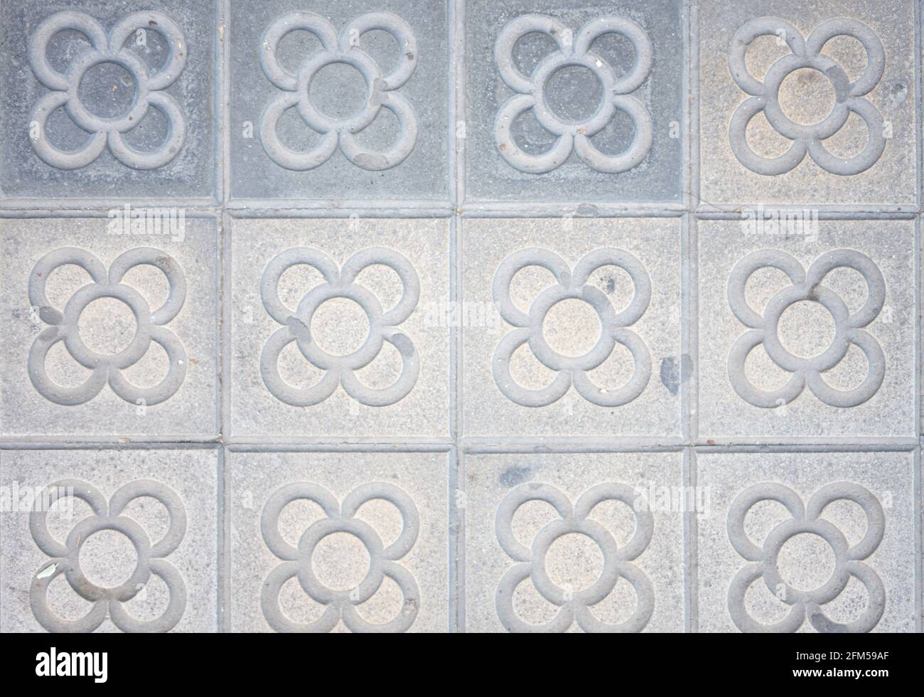 tiles with flowers typical of barcelona city Stock Photo - Alamy