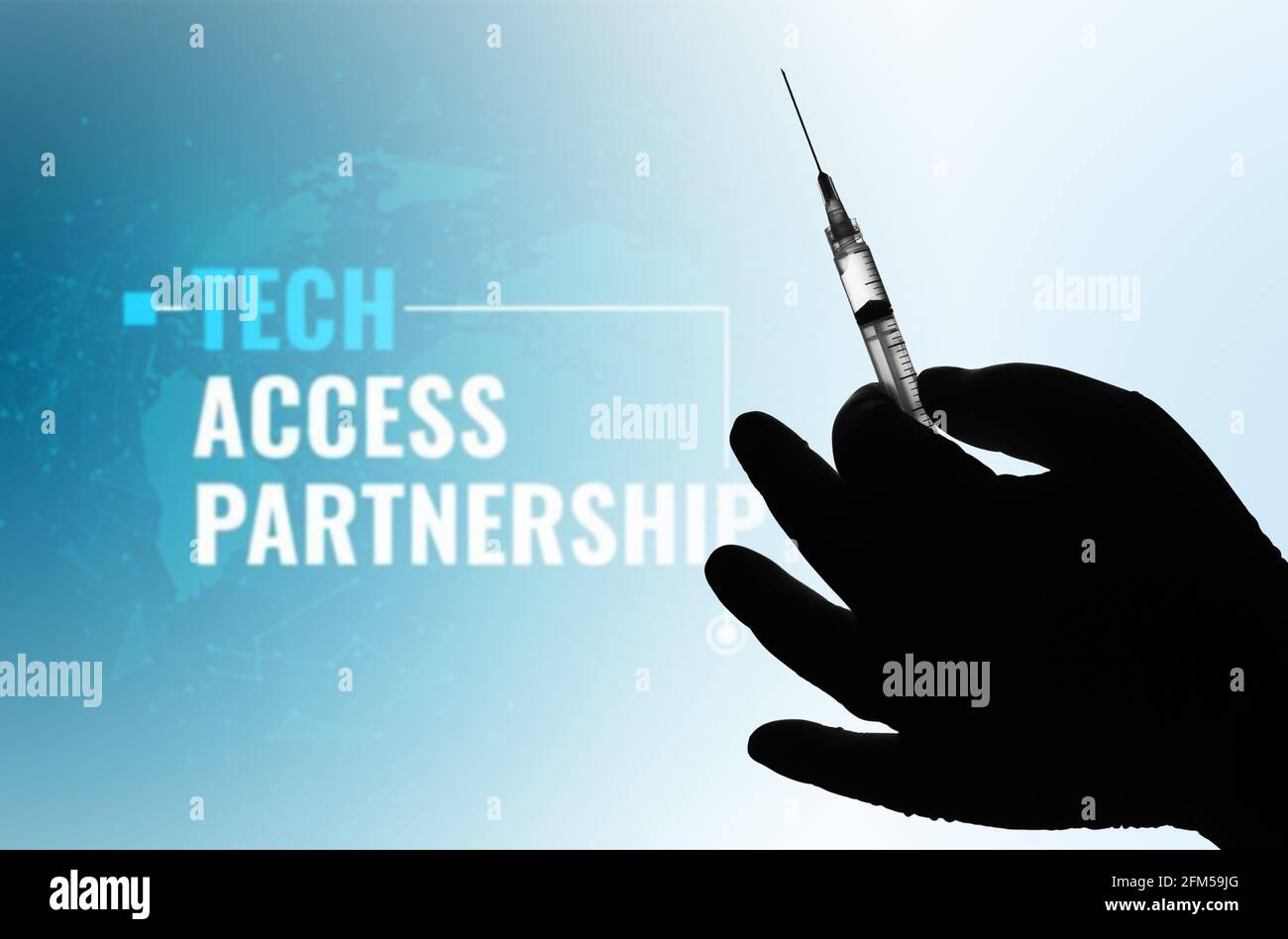 In this photo illustration a hand holding a medical syringe is seen ...