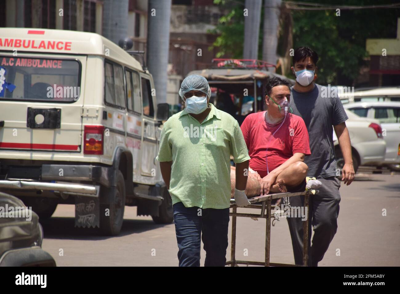 Prayagraj. May 6 2021: Family members shift a COVID19 patient to ...