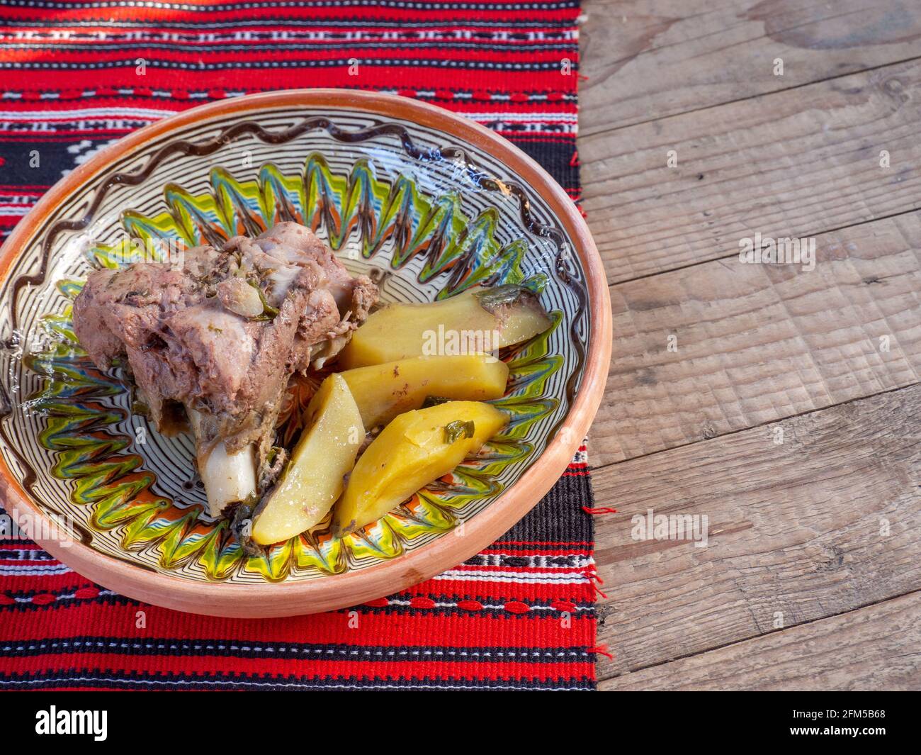Top view of a lamb steak and potatoes Stock Photo - Alamy