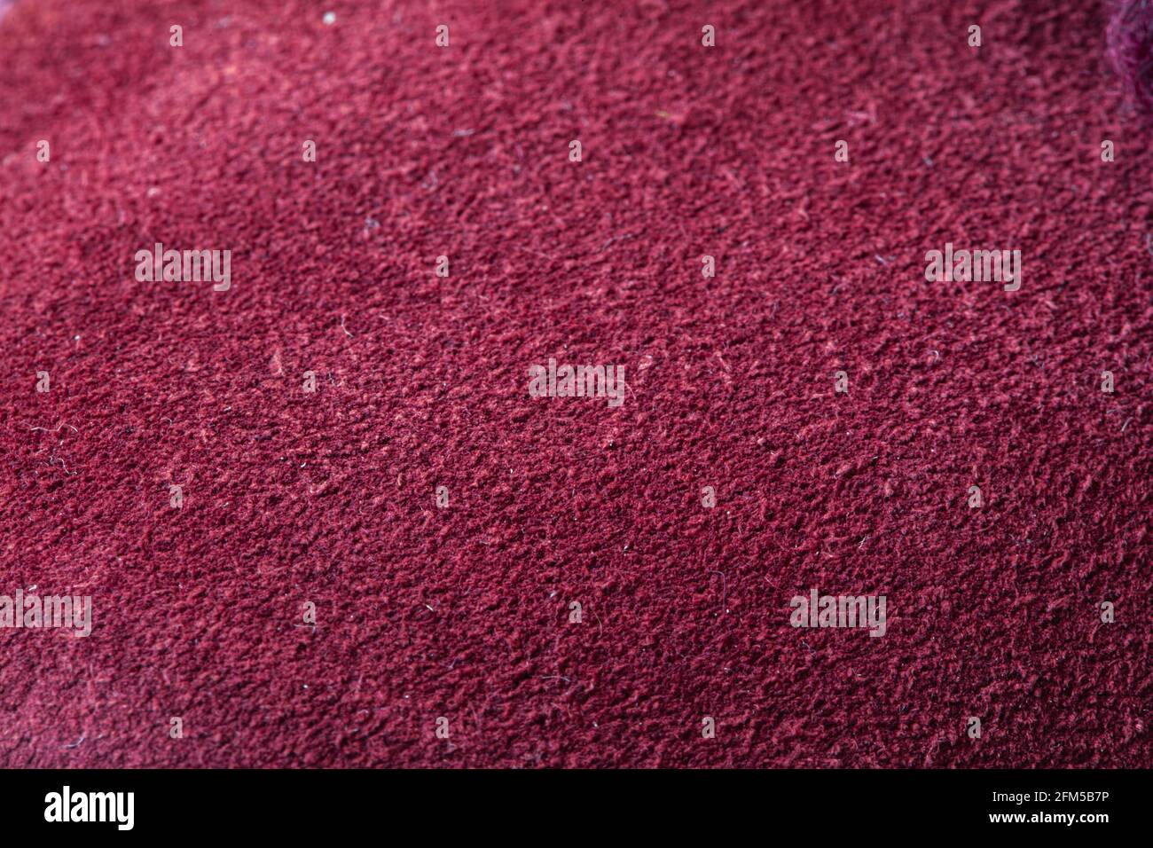 wine color suede textured background for design purpose Stock Photo - Alamy