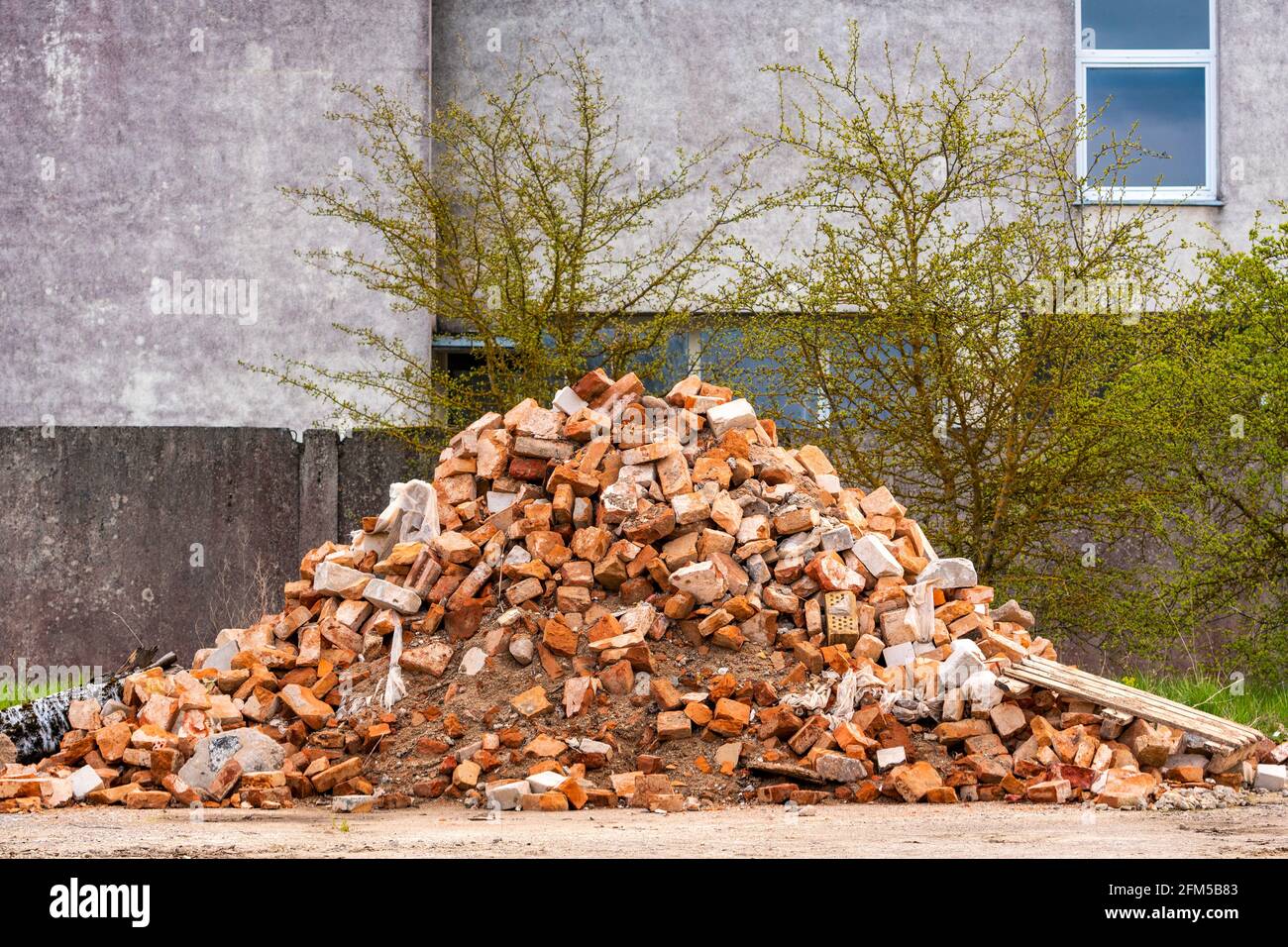 A pile of construction waste. Building rubble and stones. Abandoned ...