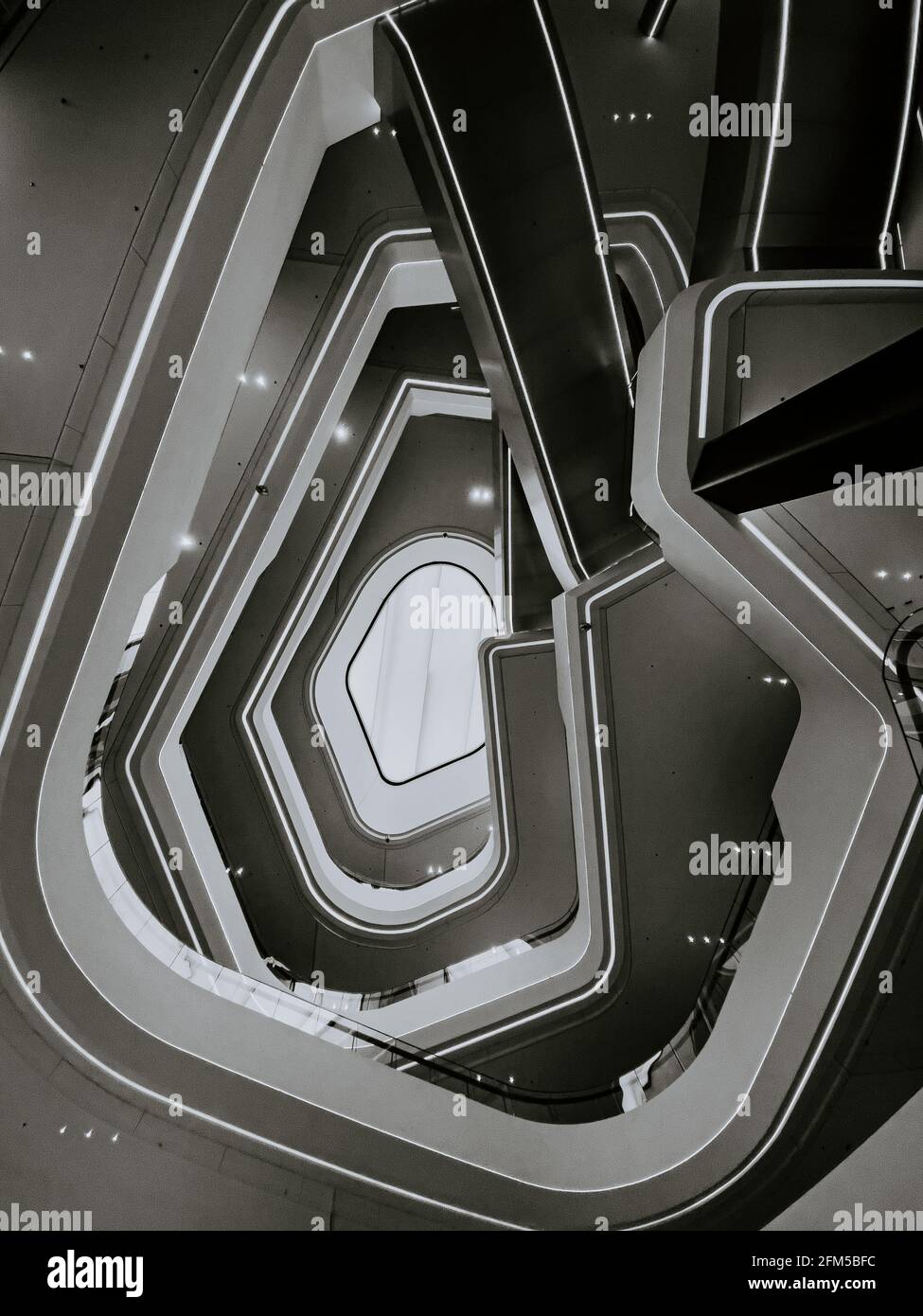 Grayscale shot of square concrete stairway perspective Stock Photo - Alamy