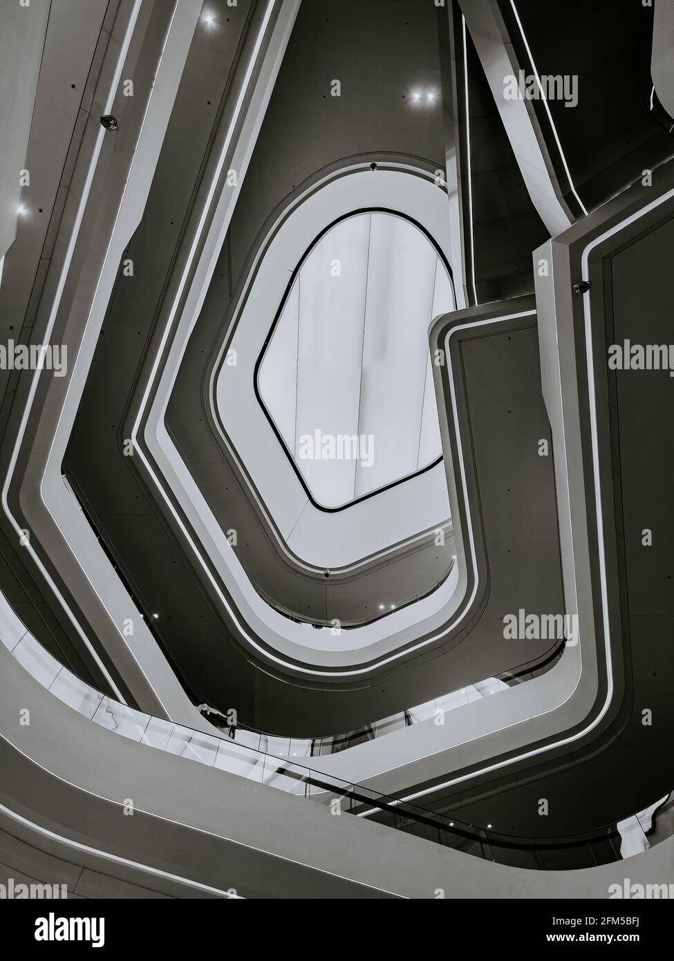 Grayscale shot of square concrete stairway perspective Stock Photo - Alamy