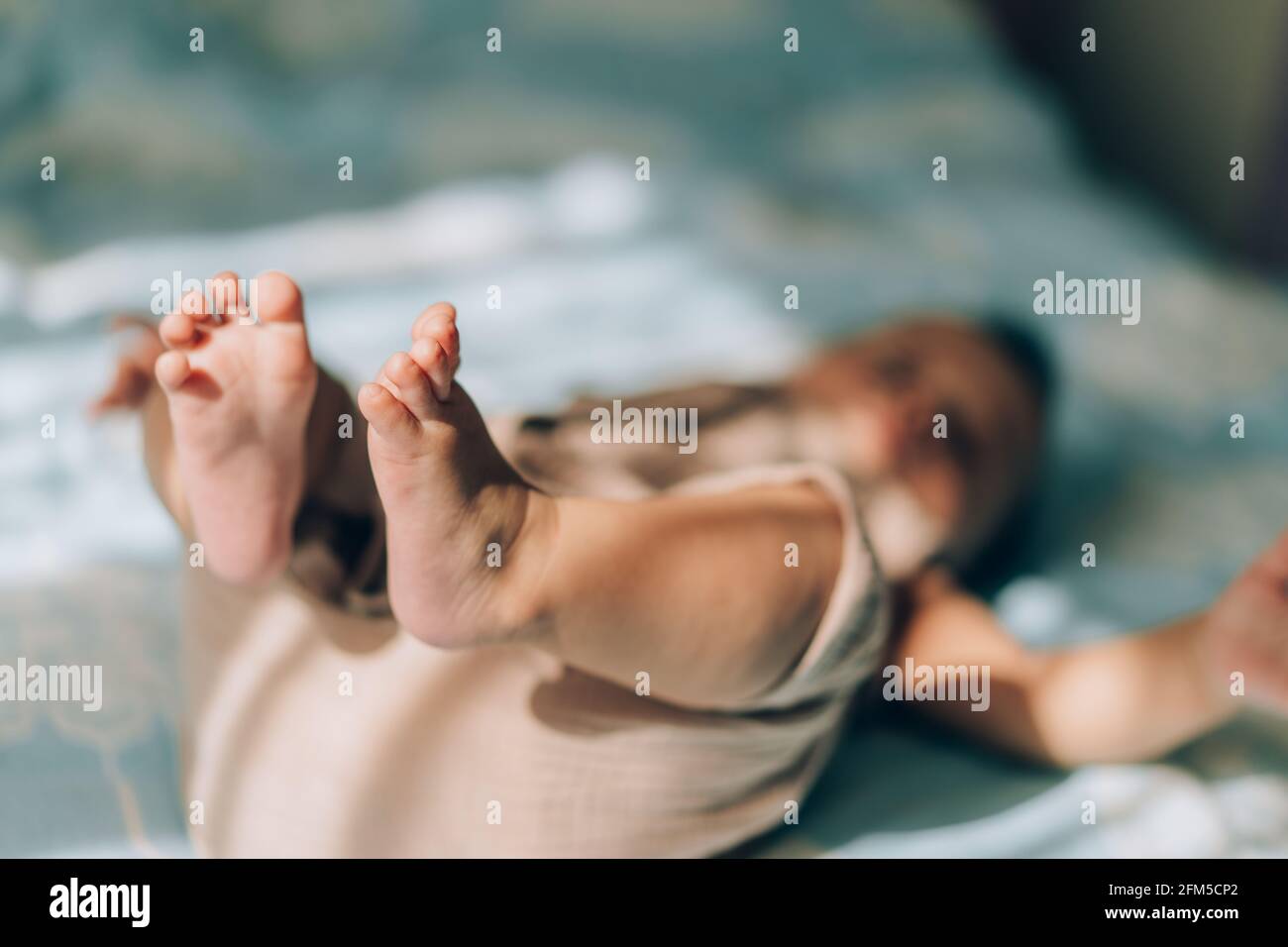 Child adoption and In Vitro Fertilization IVF . Asian child lying on ...