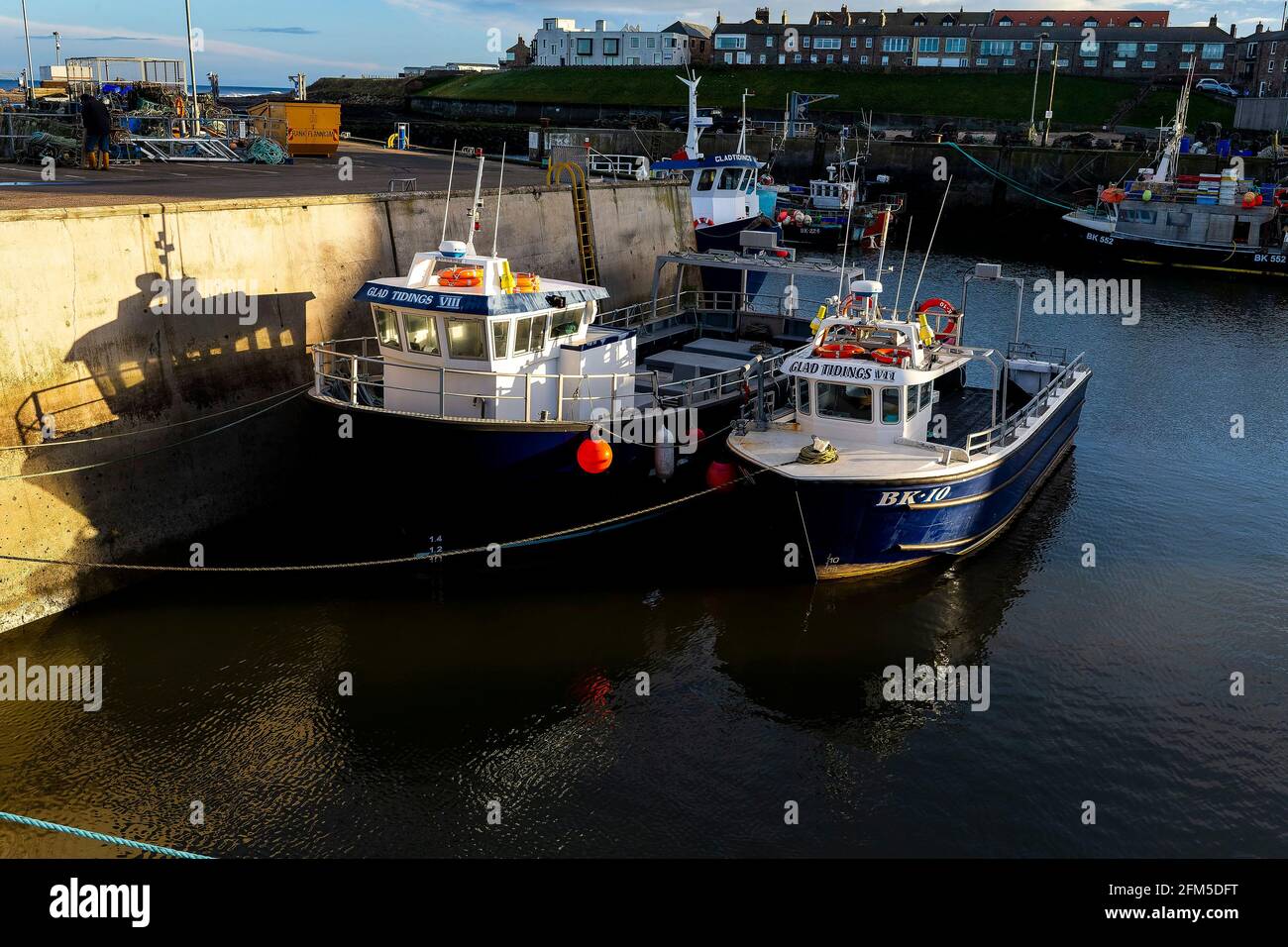 Fishing fleet in harbor at Seahouses, Northumberland, England Stock ...