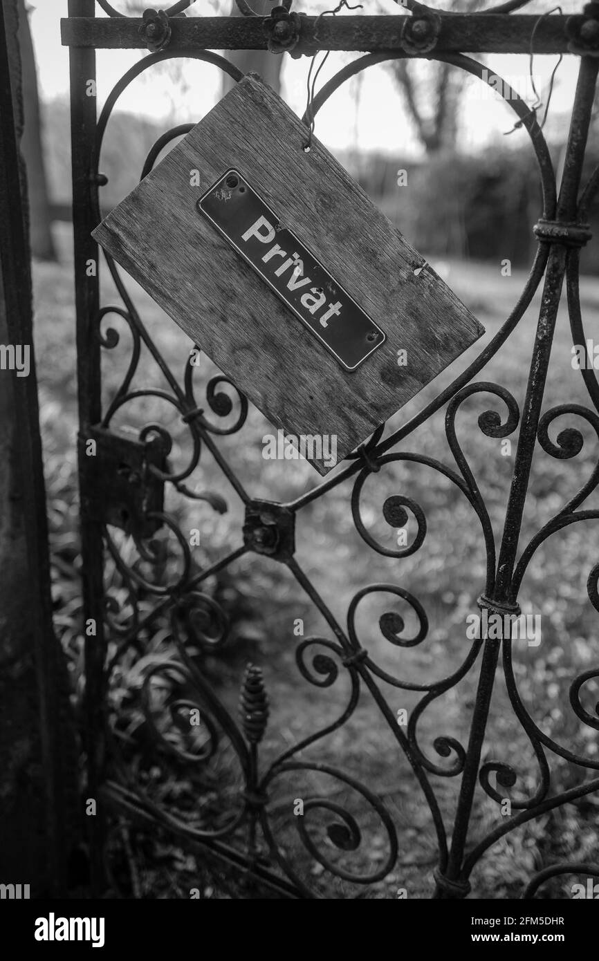 Sign on wooden fence Black and White Stock Photos & Images - Alamy