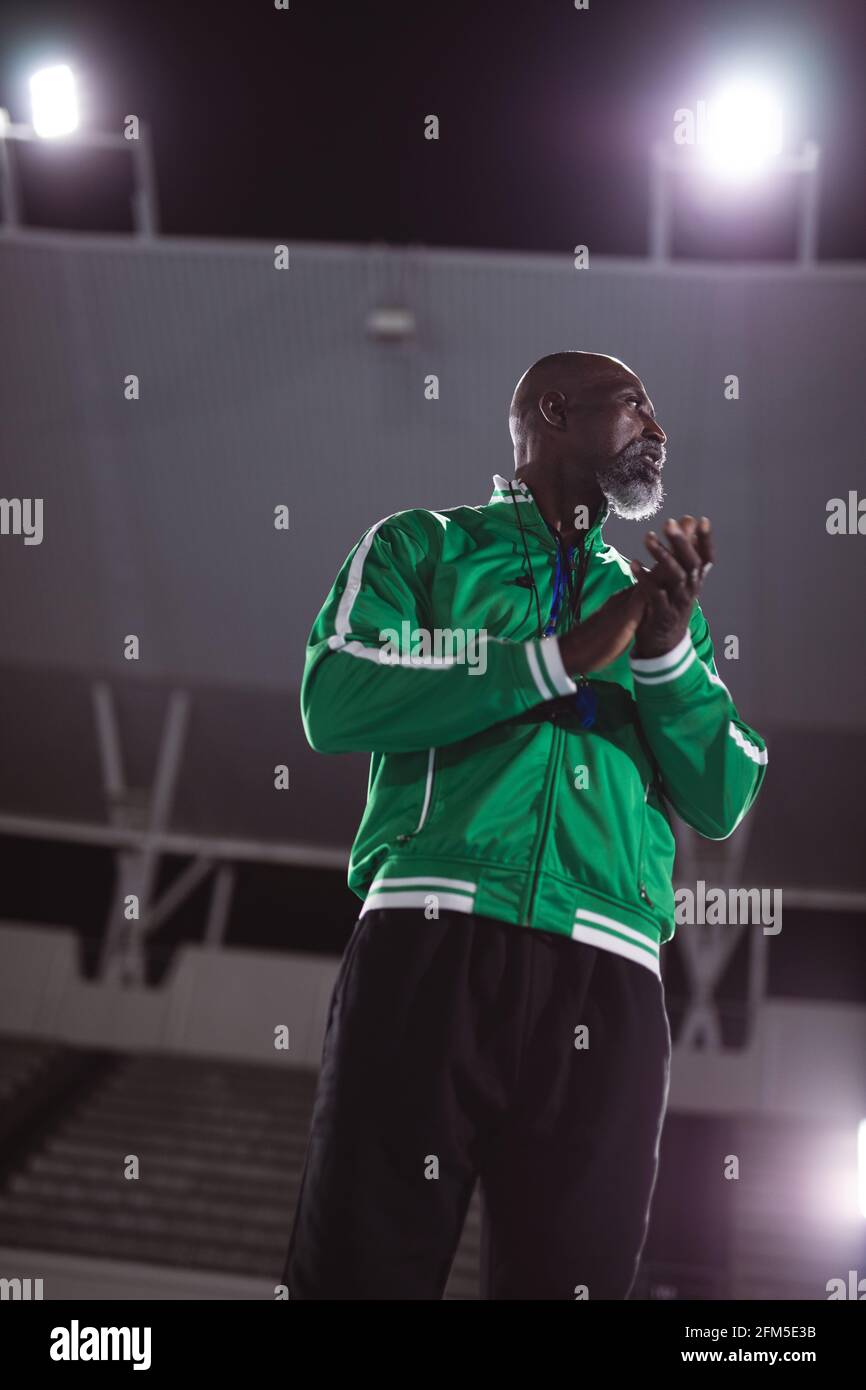 Male coach clapping athlete hi-res stock photography and images - Alamy