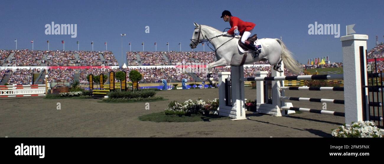 ANDREW HOY OF AUSTRALIA, SEP 2000 JUMPS THE LAST FENCE TO WIN THE GOLD ...