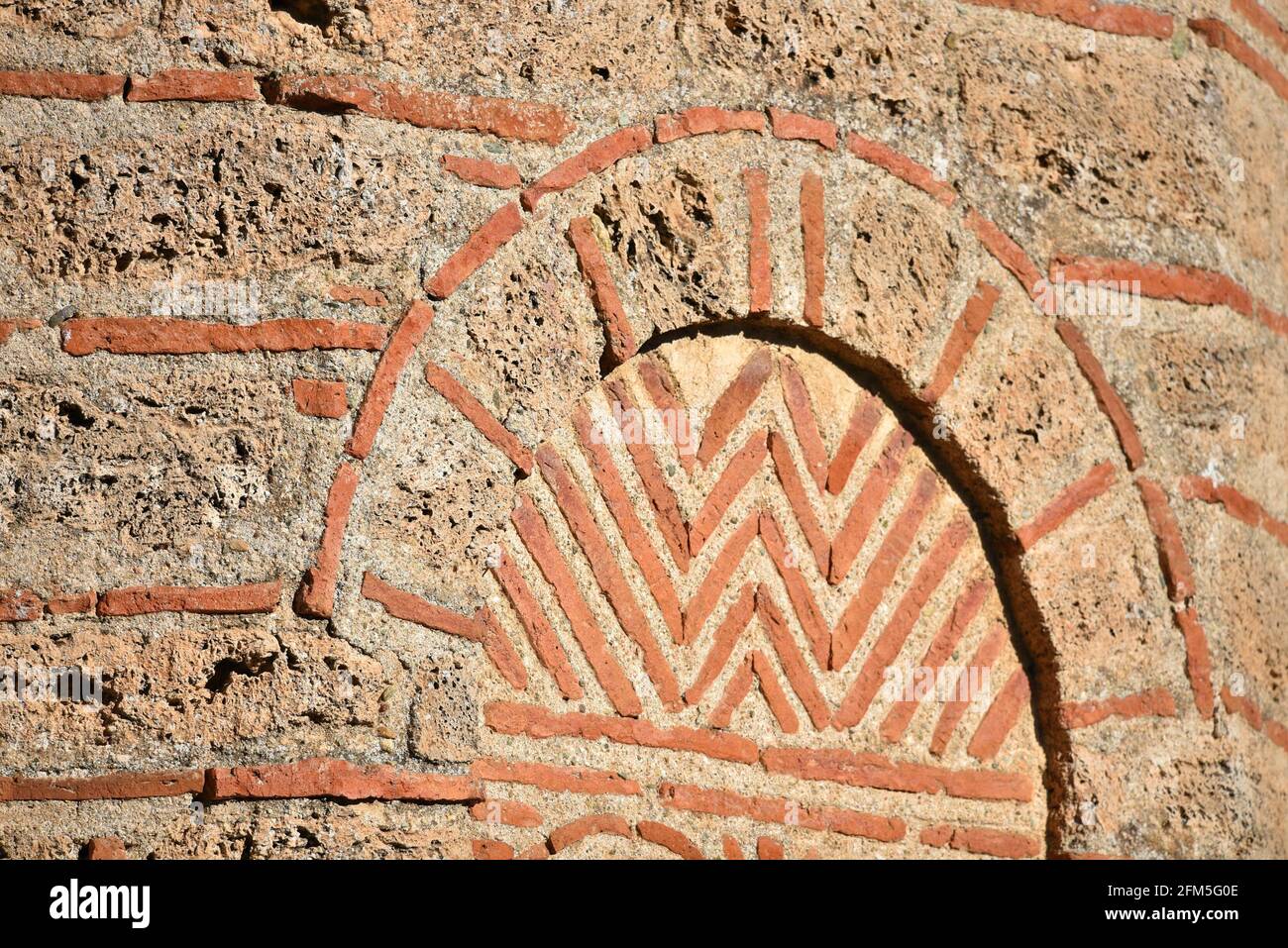 Byzantine church handcrafted red clay tile and stone exterior wall of ...